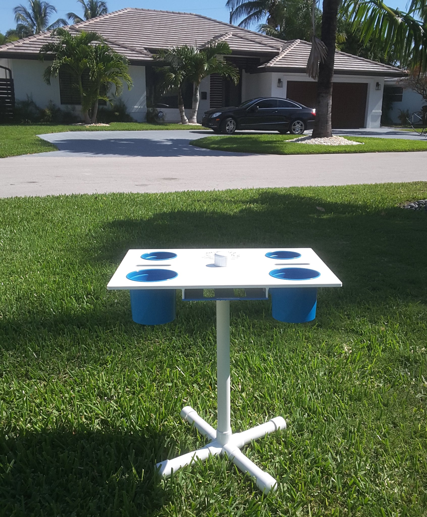 Octable Beach Table octopus octables sand cell phones, red cups,